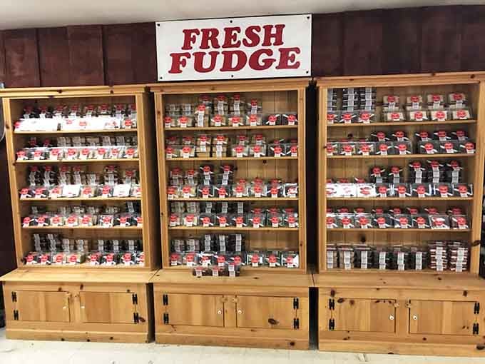 An entire wall dedicated to fresh fudge flavors, proving that some indulgences are worth every single calorie you're about to consume.