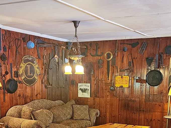 These walls tell stories through vintage signs and antiques, like dining inside someone's really cool grandfather's collection.