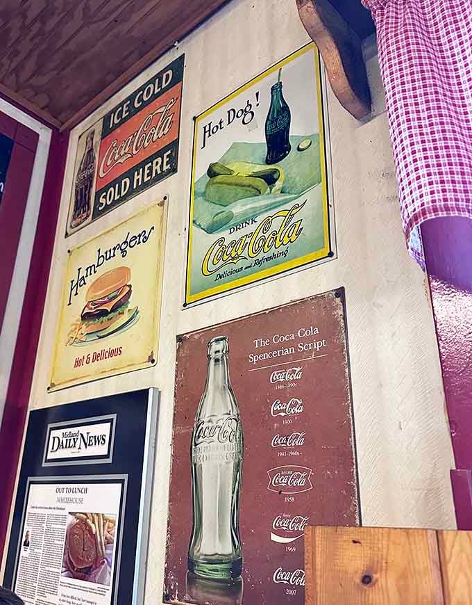 Vintage Coca-Cola signs and newspaper clippings on the walls, every inch of this place tells a story worth reading.