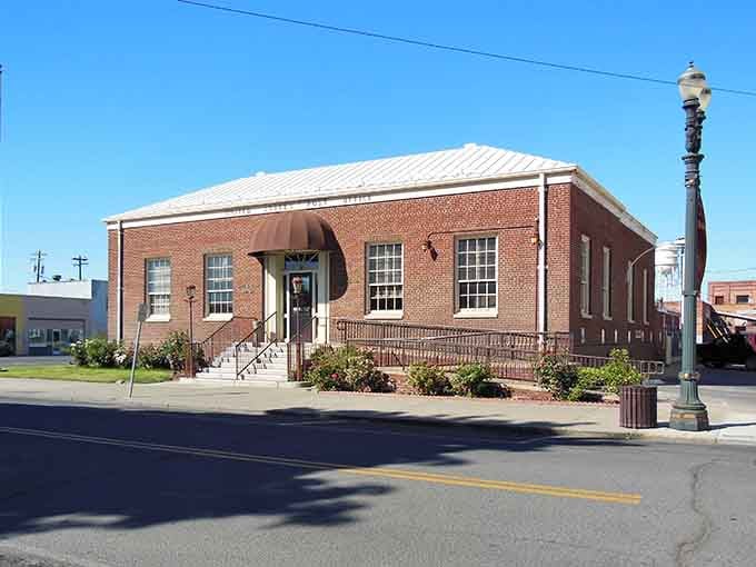 A tidy brick post office that looks like it was built to last forever, and honestly, it just might.
