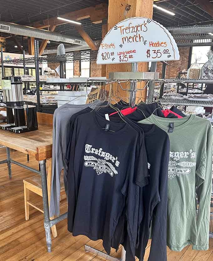 When a bakery sells its own merch, that's not a gift shop. That's a fan club with hoodies.
