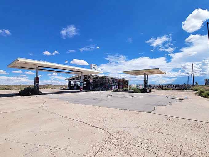 The old gas station canopy still stands, sheltering nothing but memories and spectacular desert views.