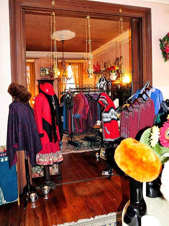 Colorful alpaca apparel fills a warmly lit room with hardwood floors. Shopping here feels like discovering a hidden treasure chest.