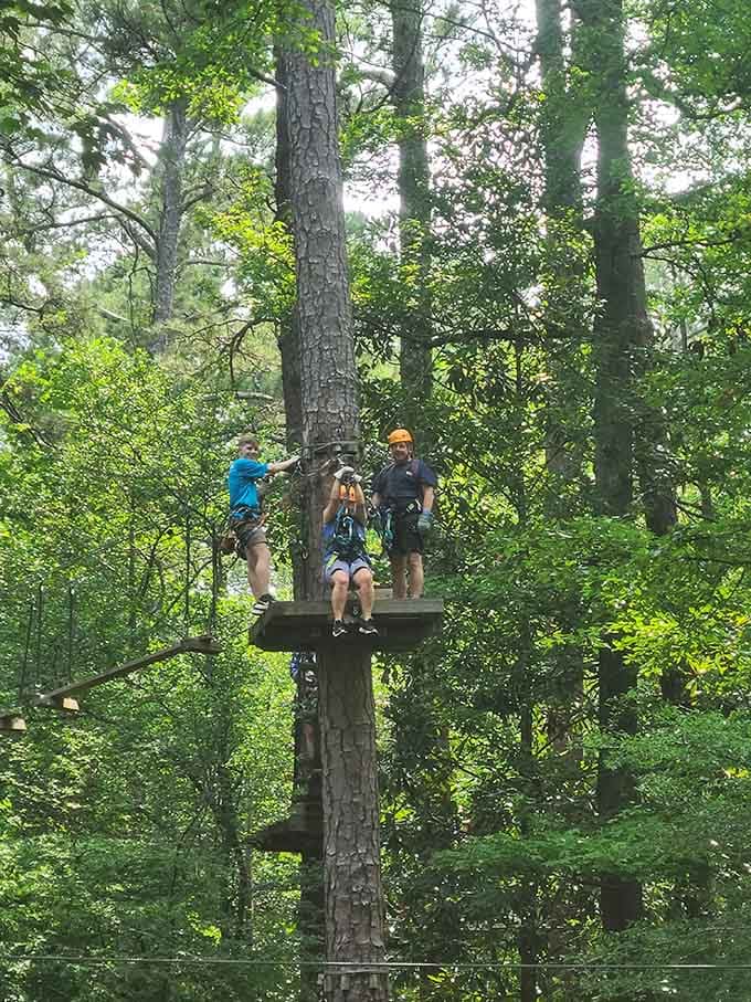 Helmets on, harnesses clipped, smiles wide — the zip line experience at Callaway Gardens is pure treetop joy.