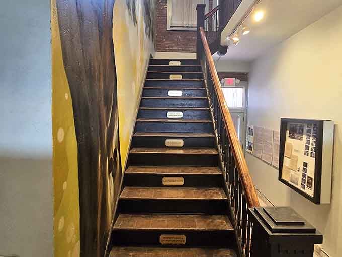 Each step on this staircase carries a small plaque, turning an ordinary climb into a walk through Disney history.