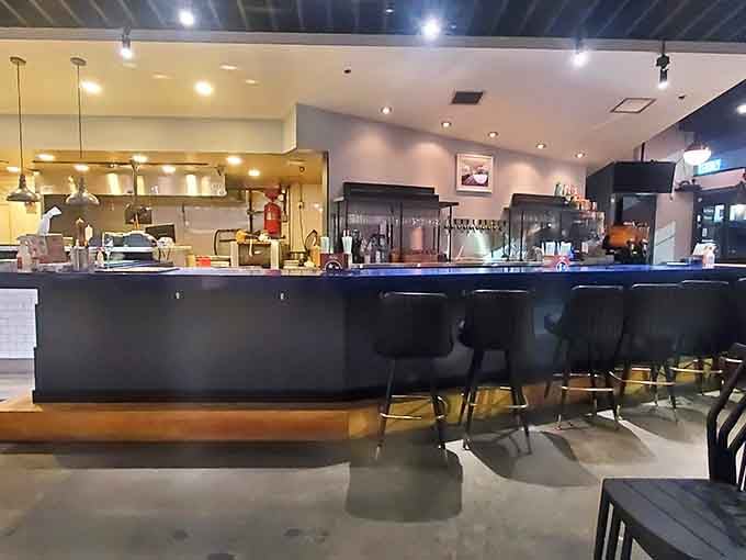 Counter seating at the bar puts you front and center for all the action, best seat in the house.