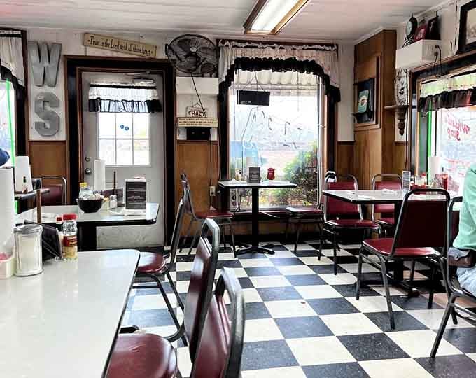 Cozy dining room with vintage touches and ceiling fans where time slows down and nobody rushes your meal experience.