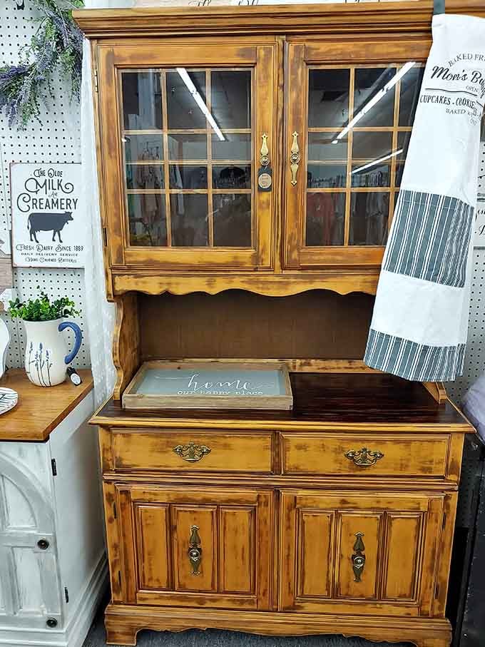 This warm honey-toned hutch has original hardware and serious character, the kind of piece that anchors a whole room.