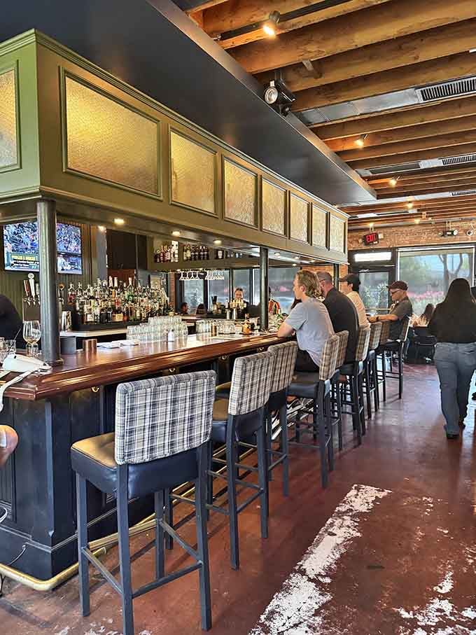 Windsor's bar stretches long and inviting, plaid stools lined up like old friends saving each other seats.
