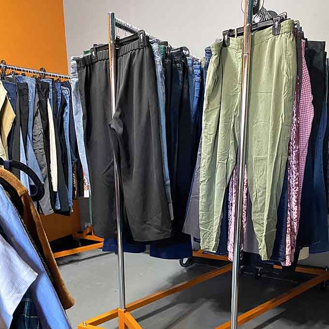 Neat racks of trousers in every style imaginable, sorted by size and ready for their next great adventure.