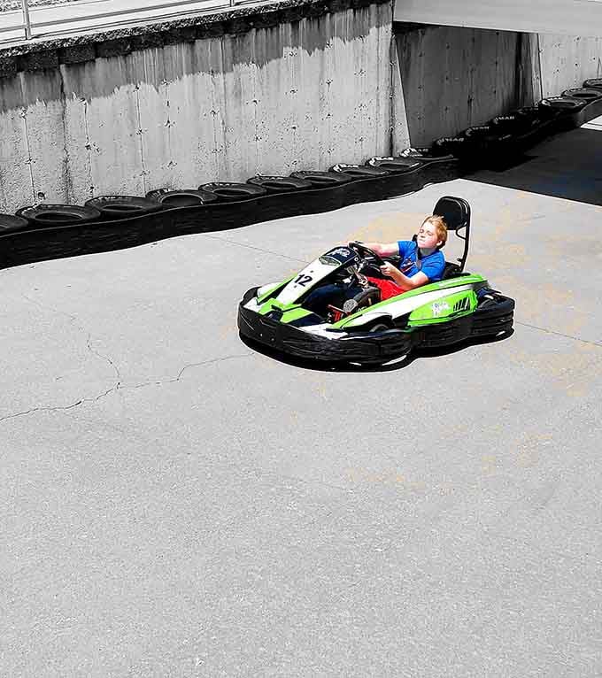 Even the youngest drivers look completely at home behind the wheel. Future champion energy, right there on kart number 12.