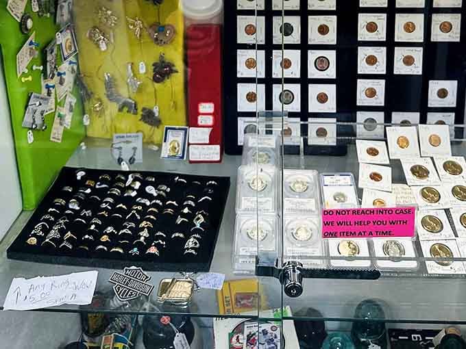 Rows of rings, graded coins, and collectible jewelry, proof that the real gems at this market aren't always the obvious ones.
