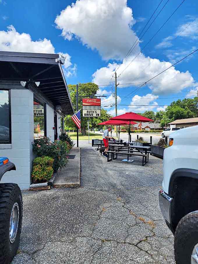 Tucked between two trucks under a brilliant blue sky, Ruth's classic Coca-Cola sign quietly anchors this beloved Hartsville neighborhood corner.