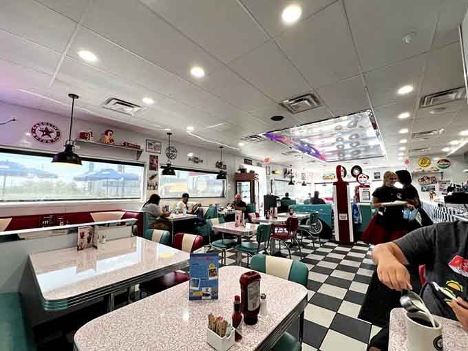 Turquoise booths, formica tables, and vintage memorabilia covering every wall. Sitting here feels like a warm, familiar hug.