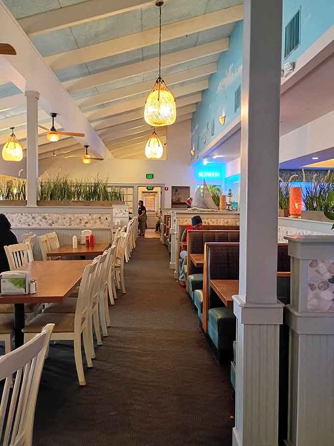Every booth, every table, every glowing pendant light is quietly saying, "Sit down, relax, and order the crab legs."