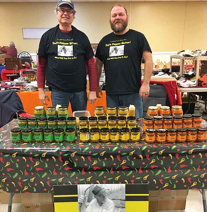 Tod's Pepper Butter vendors standing proudly behind their colorful jars, with a slogan that says it all perfectly.