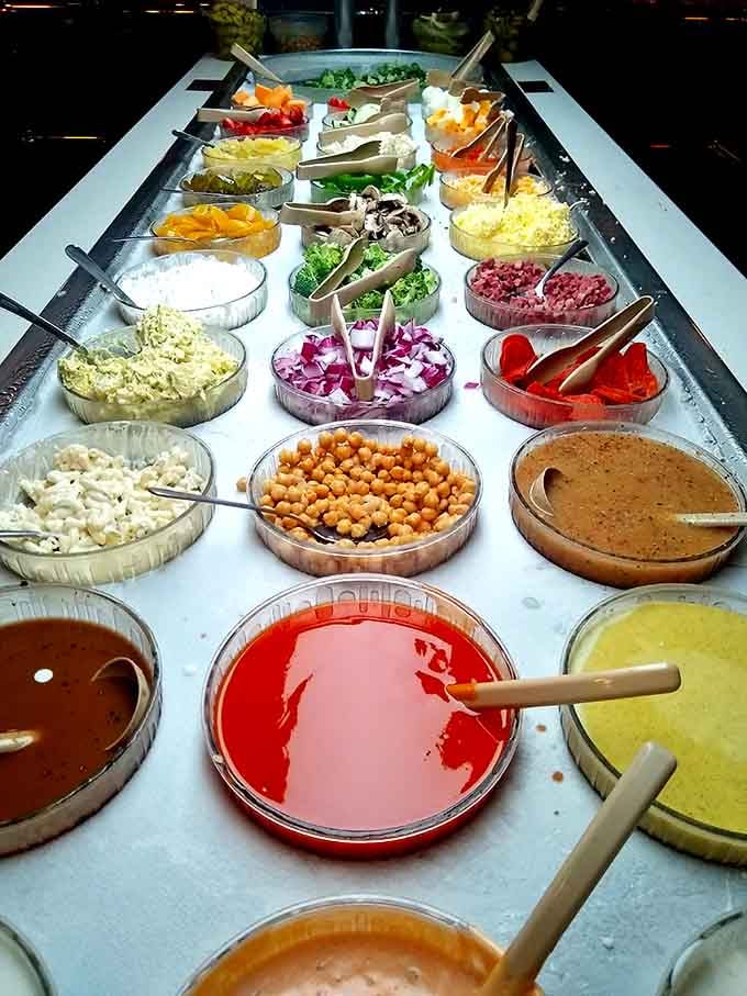 The salad bar offers a rainbow of fresh toppings and dressings, turning greens into a customizable masterpiece.