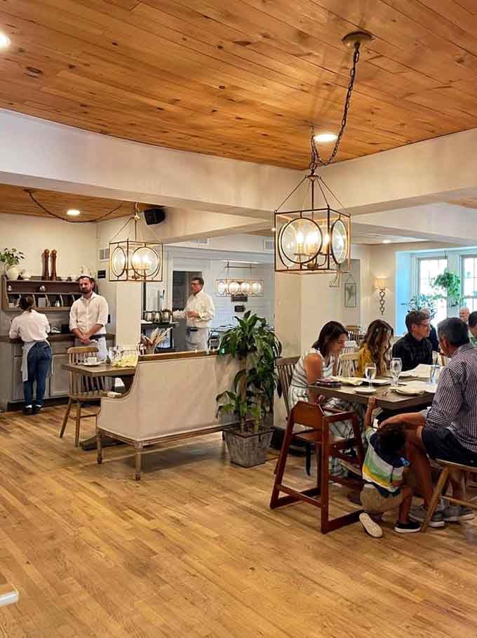 Happy diners, attentive staff, and a kitchen you can almost see. This is exactly what a neighborhood restaurant should feel like.