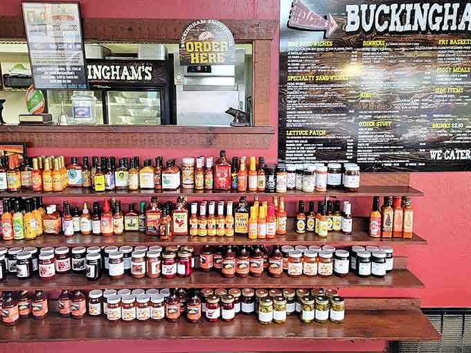Rows of hot sauces, BBQ sauces, and jarred goods lined up like a hall of fame for condiment enthusiasts everywhere.