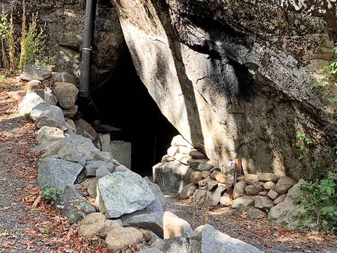 The unassuming entrance hides an entire furnished home carved into the mountainside, nature's ultimate secret.