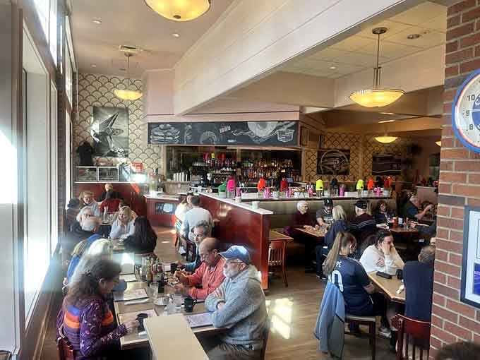 Brick walls and comfortable seating create that neighborhood gathering spot vibe everyone's been searching for without knowing it.