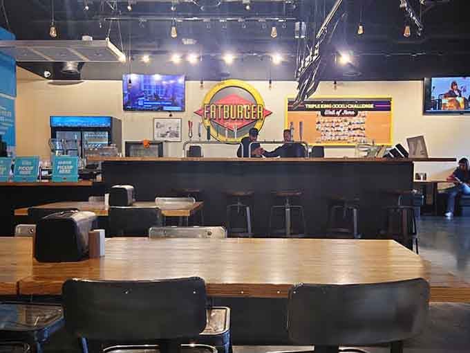 Fatburger's classic sign and wooden tables say one thing clearly: refuel here before round two of shopping begins.