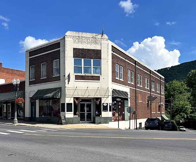 Corner building, mountain backdrop, local business doing its thing. The Farrar building is downtown Clifton Forge in one frame.
