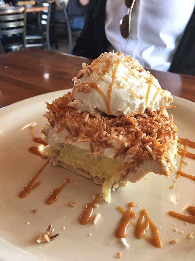 Toasted coconut, caramel drizzle, and a cloud of whipped cream — this coconut cream pie is dessert showing off shamelessly.