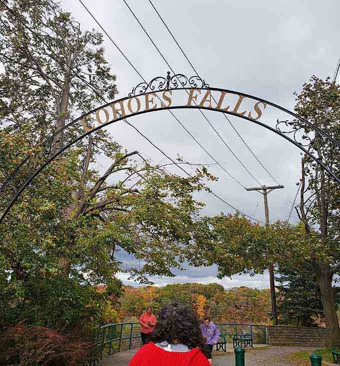 That welcoming arch says "Cohoes Falls" like it's announcing the headliner at the world's best natural venue.
