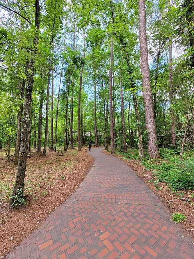 This herringbone brick path winds gracefully toward the forest, looking far too elegant for a free national park.