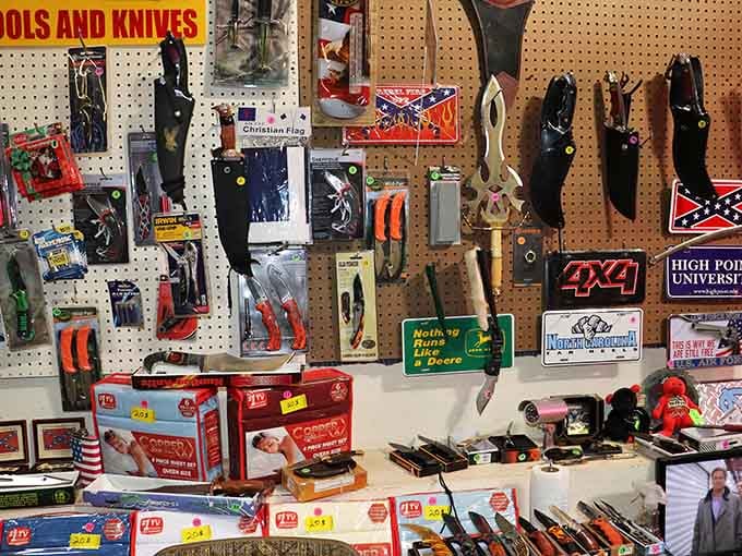 Tools, knives, and novelty signs packed onto one pegboard, a one-stop shop for the practical and the playful.