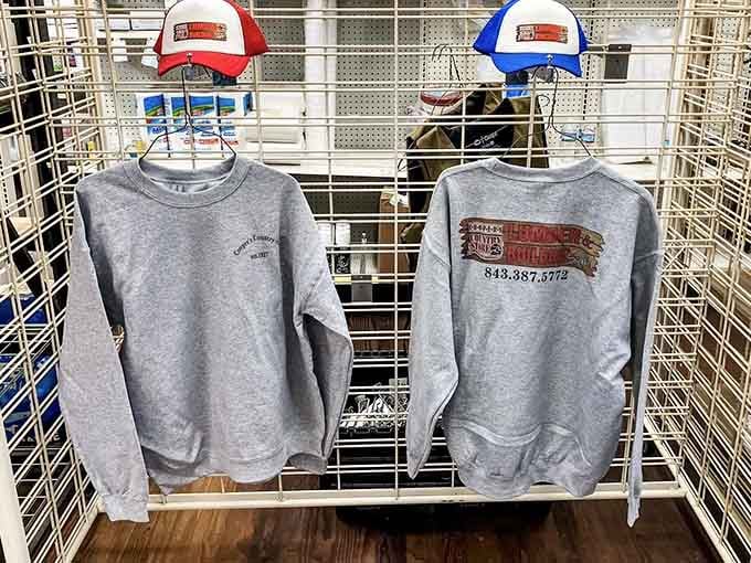 Cooper's branded sweatshirts and trucker hats &mdash; because some places earn the right to put their name on your chest.