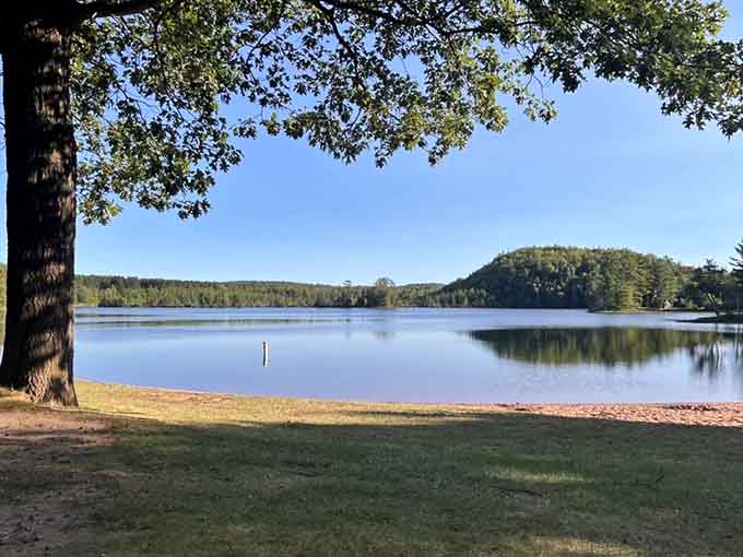 Loon Lake sits so perfectly still on a calm morning that you'll wonder if someone painted it there overnight.