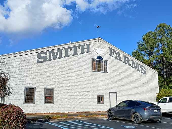 The bold lettering on this classic white barn announces a destination where fresh produce and country charm never go out of style.