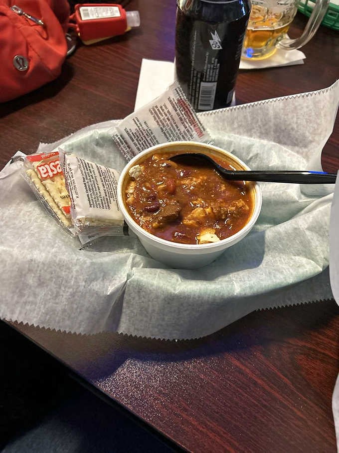 A hearty bowl of homemade spicy chili packed with meat and all the fixings. Cold Michigan day? Problem officially solved.