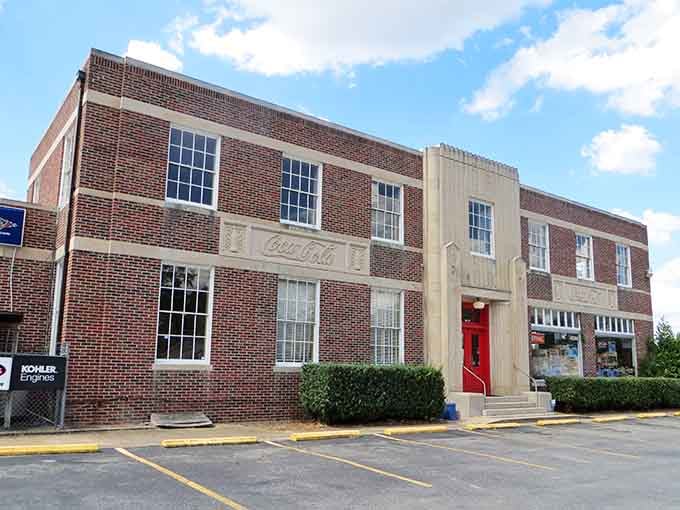 The old Coca-Cola plant building is a downtown anchor with serious bones. Classic architecture and a red door that means business.