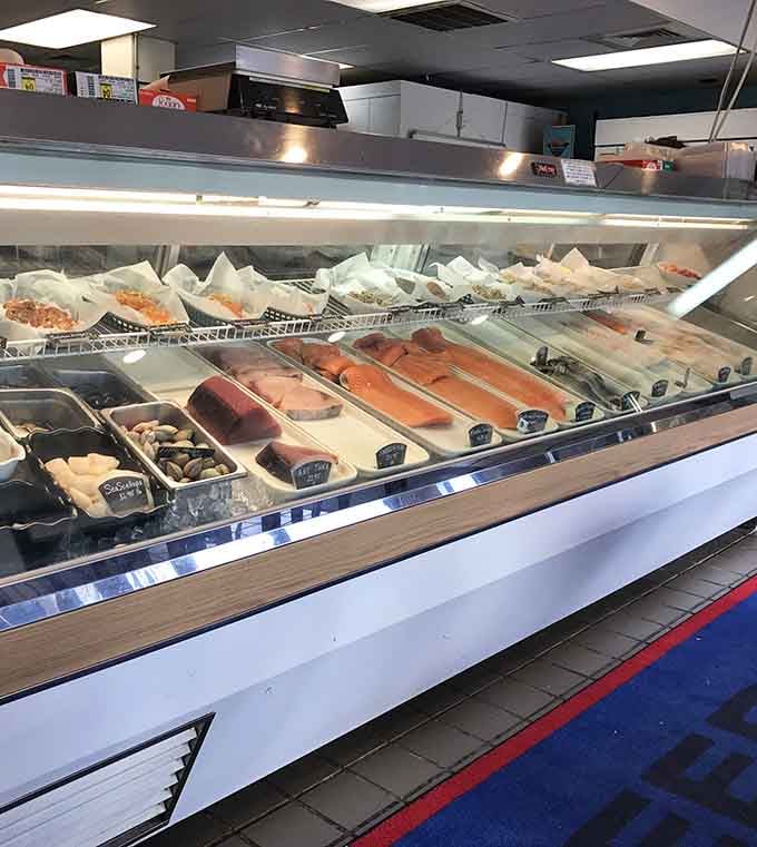 Rows of pristine salmon, swordfish, and shellfish gleaming under lights like edible jewels waiting to be discovered.