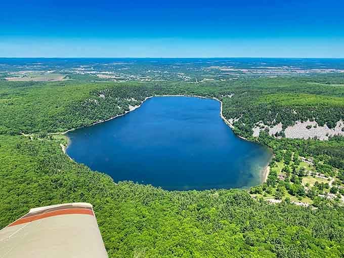 From the air, Devil's Lake looks like nature drew a masterpiece and then quietly signed it somewhere in the Baraboo Hills.