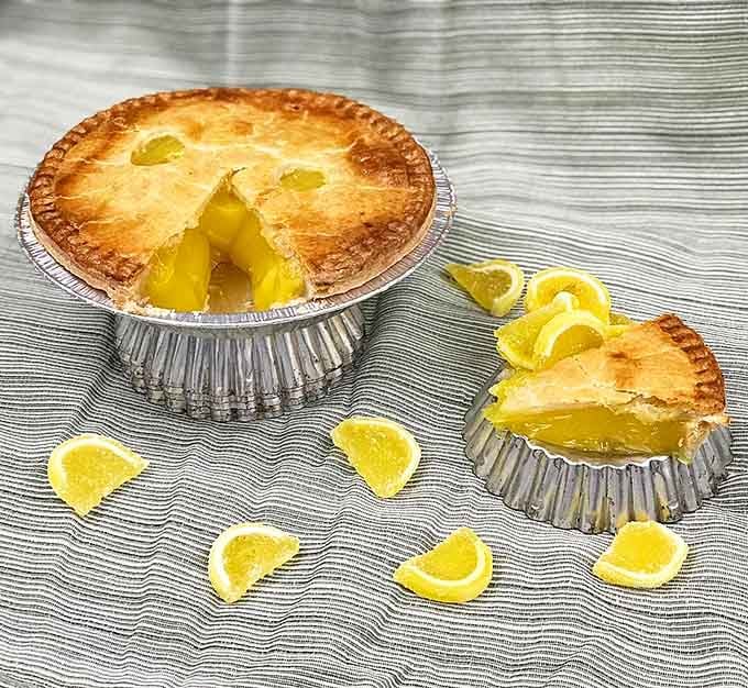 Bright, tangy lemon pie delivers sunshine in pastry form, perfect for when life needs extra sweetness.