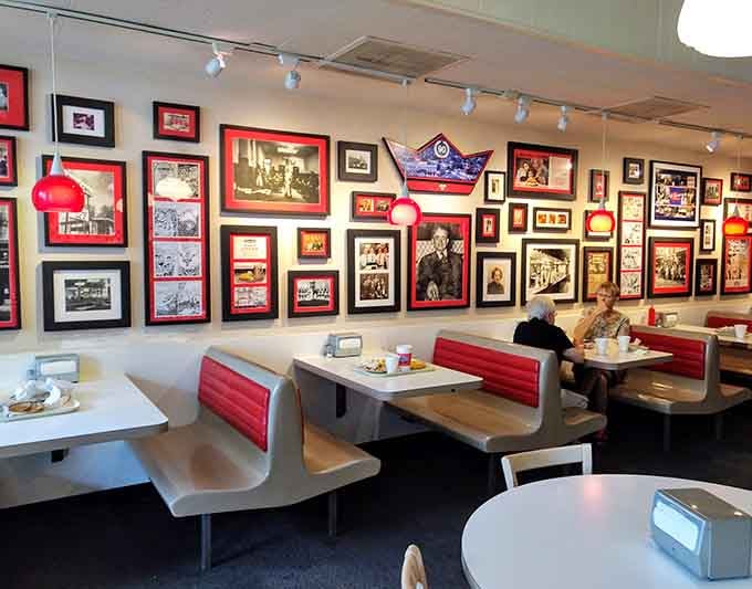 These walls hold more Newport history than most museums, each frame a window into the community's past and present.