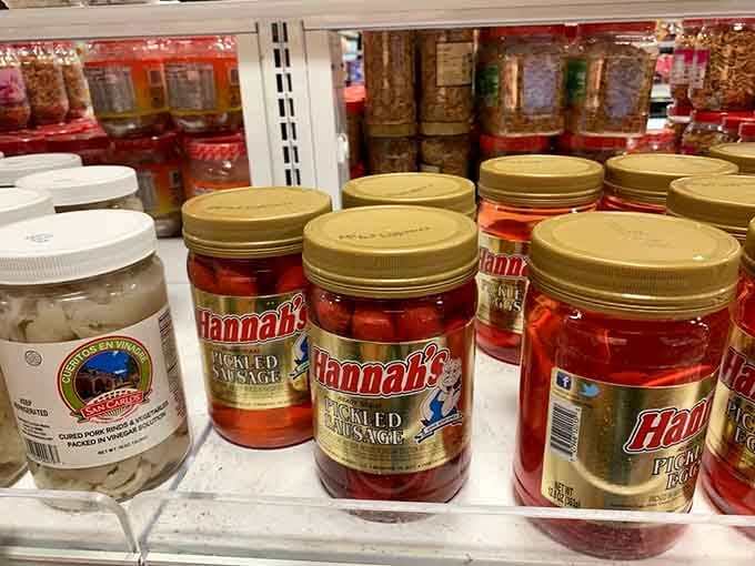 Hannah's pickled sausage sitting alongside cuertos en vinagre. Farm Fresh keeps things delightfully unexpected around every corner.