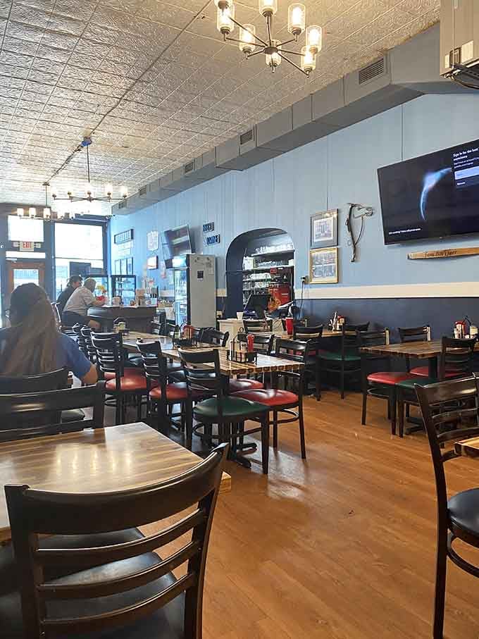 Blue walls, warm lighting, and tables full of regulars. This room has been making people feel at home for a very long time.