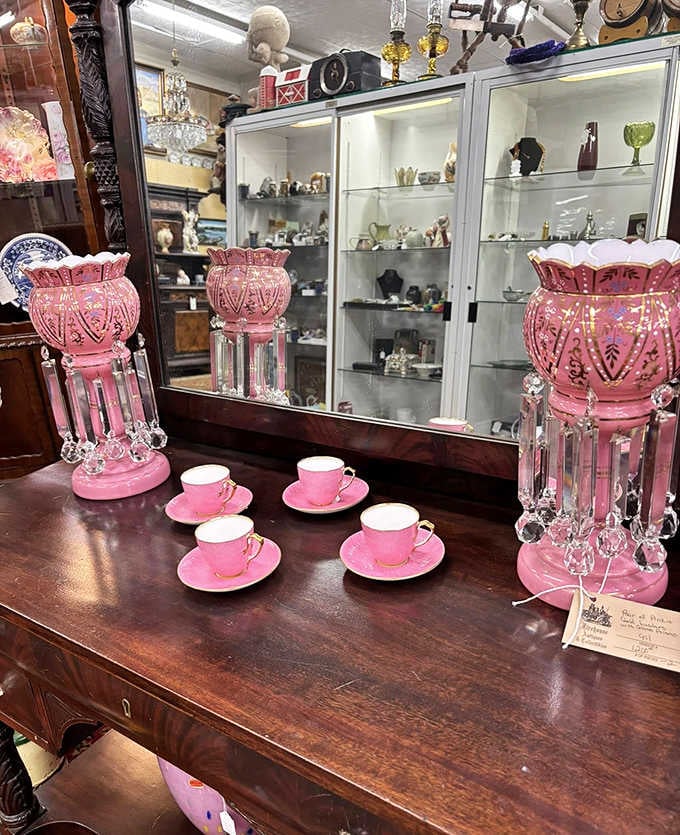 Pink mantel lustres and delicate tea cups, proof that somebody's grandmother had genuinely spectacular taste.