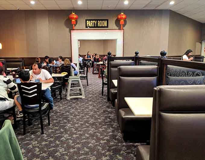 Happy diners, full plates, and a party room in the background, this place knows how to throw a feast.