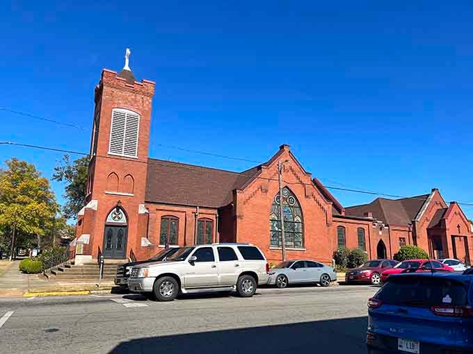 Trinity Episcopal Church stands as one of Florence's most striking landmarks, its red brick tower visible from blocks away.