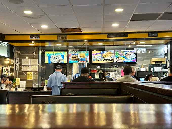 The order counter where dreams come true and portion sizes defy all logic and reason.