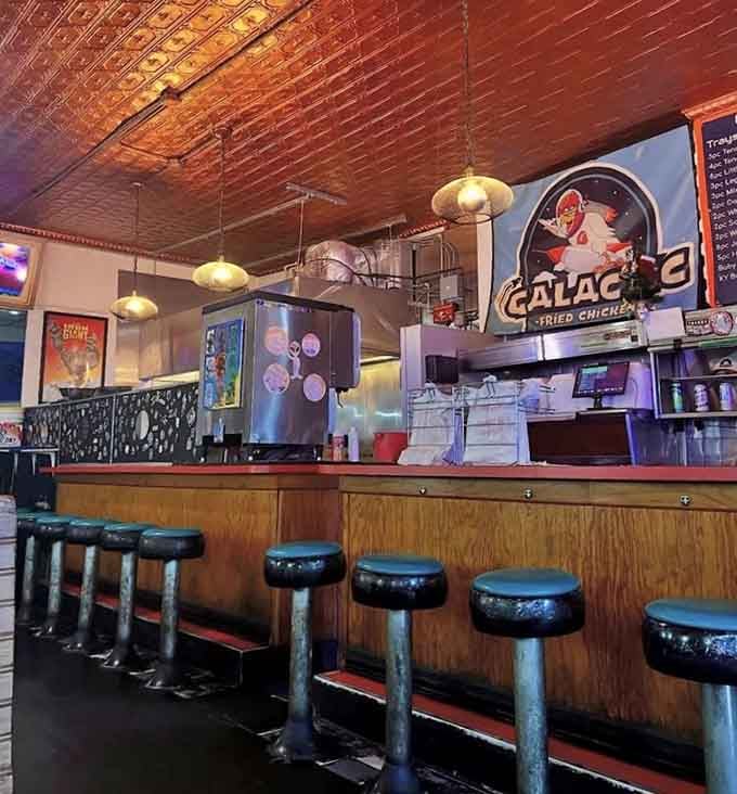 The counter where magic happens, complete with vintage stools perfect for watching your order come together before your eyes.