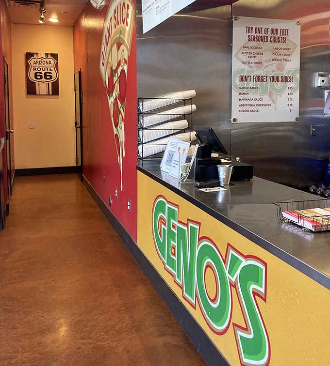 The Geno's counter greets you like an old friend, cheerful, colorful, and ready to take your order immediately.