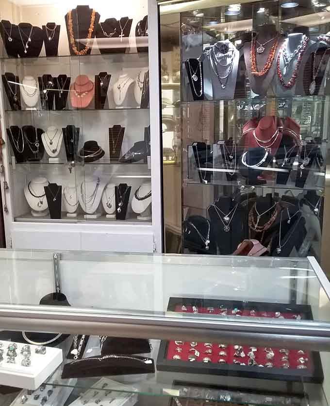 Glass cases full of silver necklaces and rings, displayed with the kind of care usually reserved for museum exhibitions.