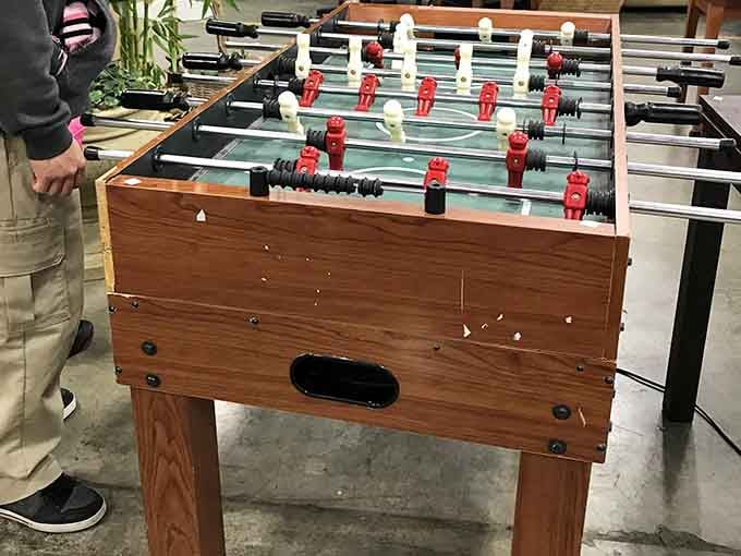 A foosball table with character, a few scuffs, and a whole lot of potential for game night glory.
